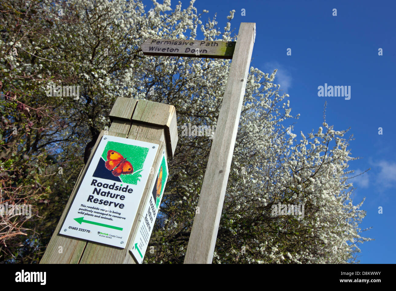Footpath sign and Roadside nature reserve signs at Wiveton Downs ...