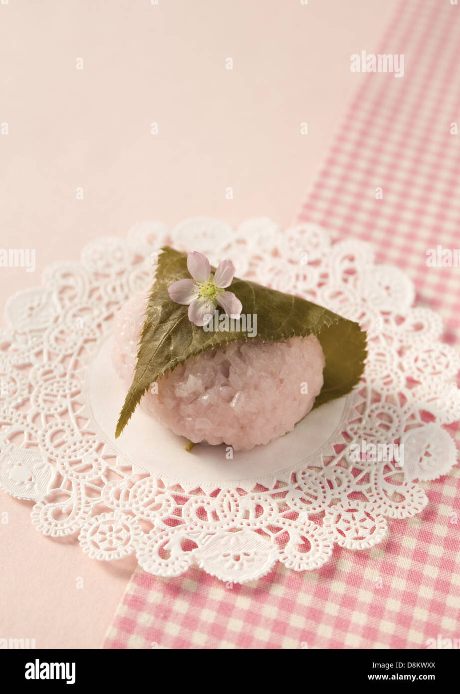Sakura mochi (cherry flavored soft sweet rice cake Stock Photo - Alamy