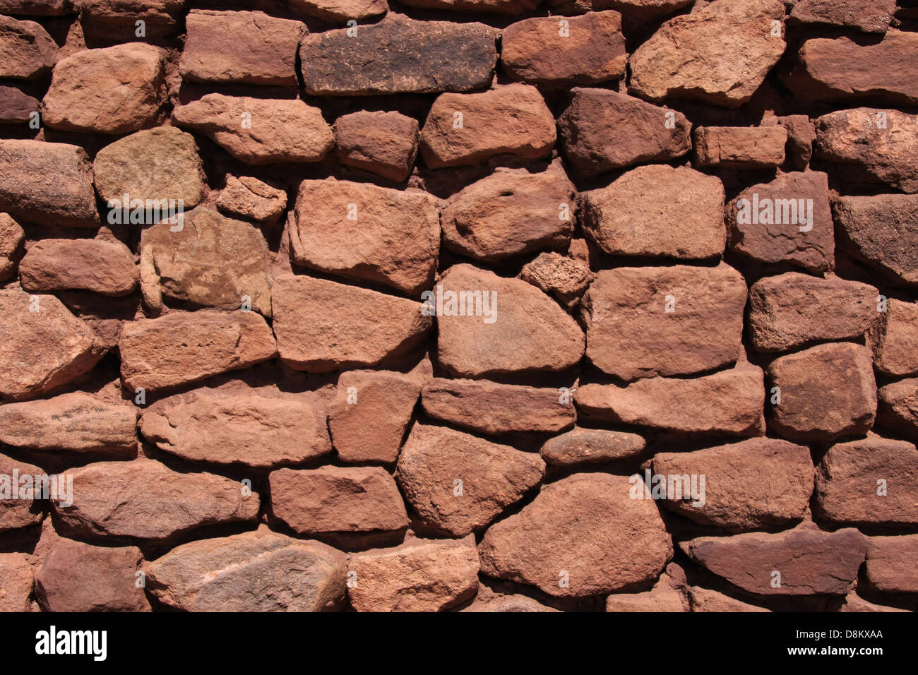 Background of reddish natural stone wall Stock Photo - Alamy