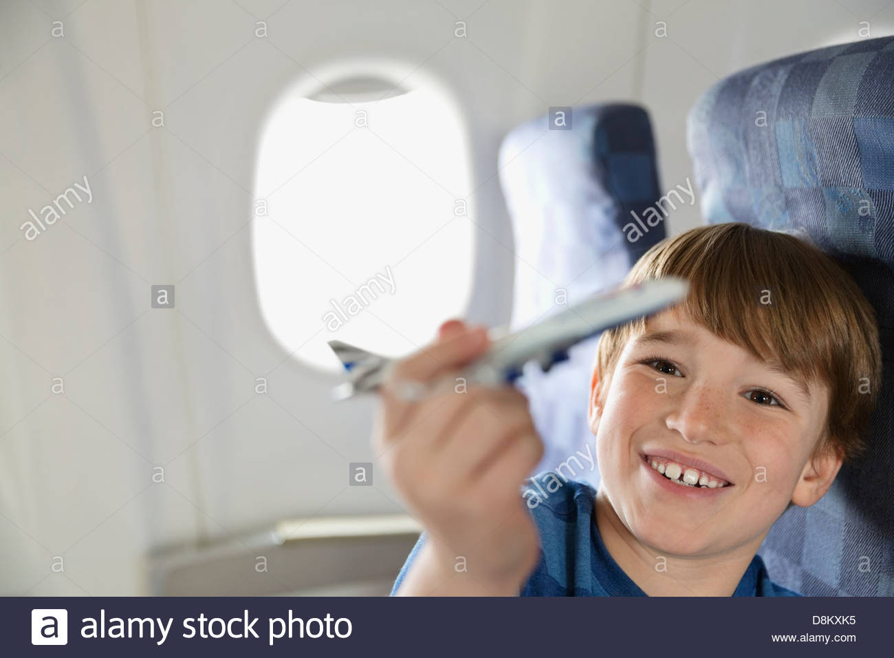 Boy plane passenger hi-res stock photography and images - Alamy