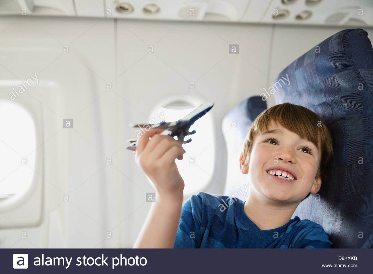 Boy plane passenger hi-res stock photography and images - Alamy