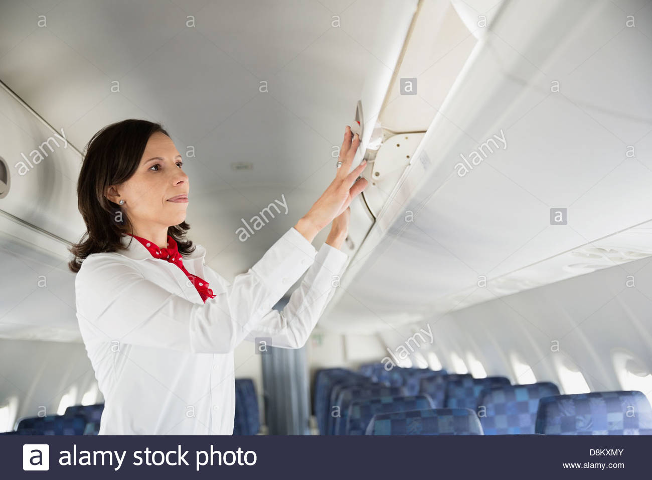 Overhead Compartment Stock Photos & Overhead Compartment Stock Images ...