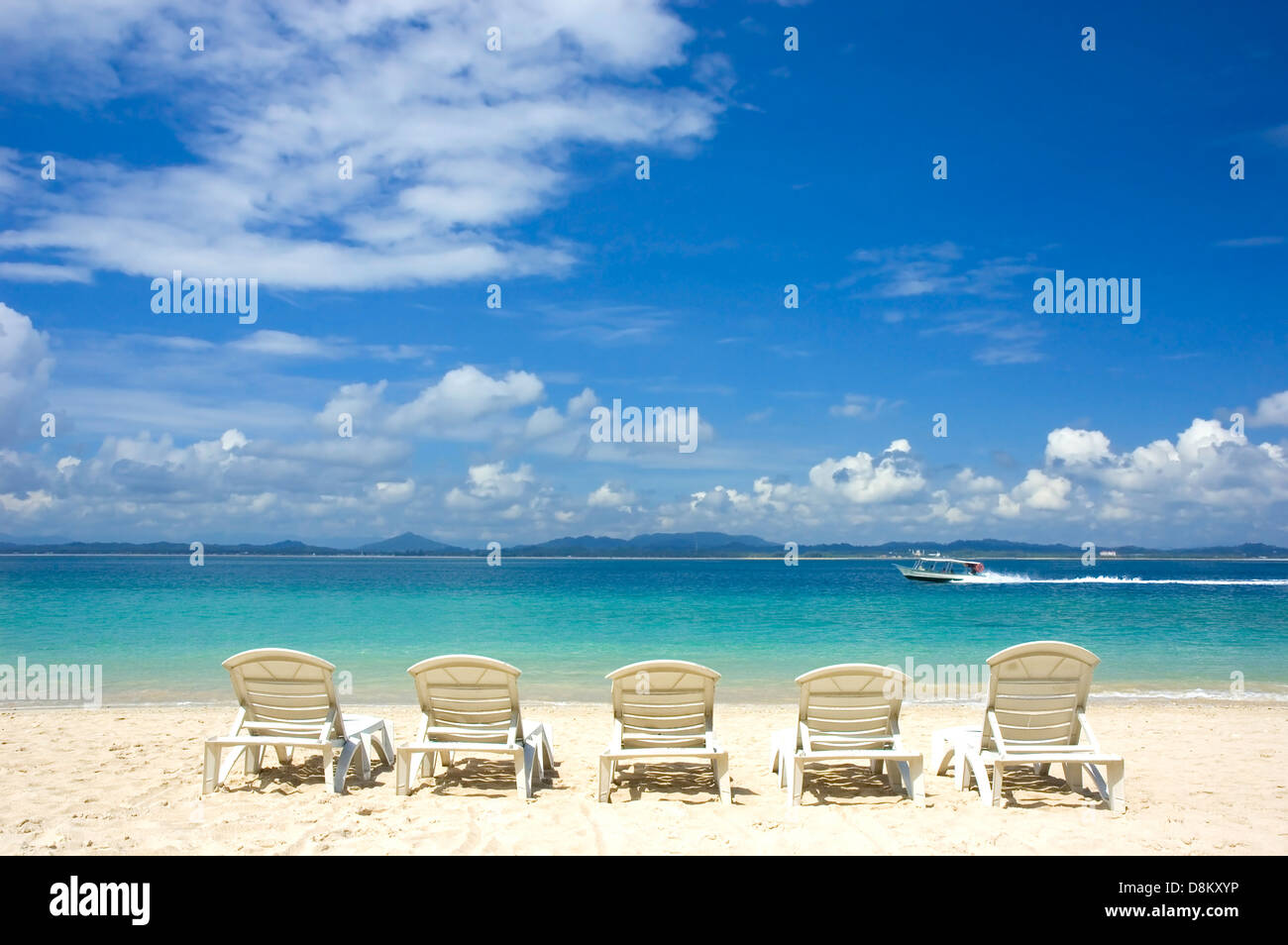 beach with chairs Stock Photo - Alamy