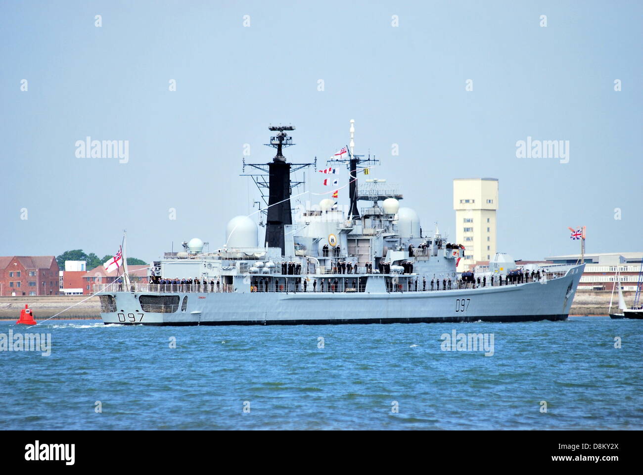HMS Edinburgh enters Portsmouth Harbour for the final time flying a ...