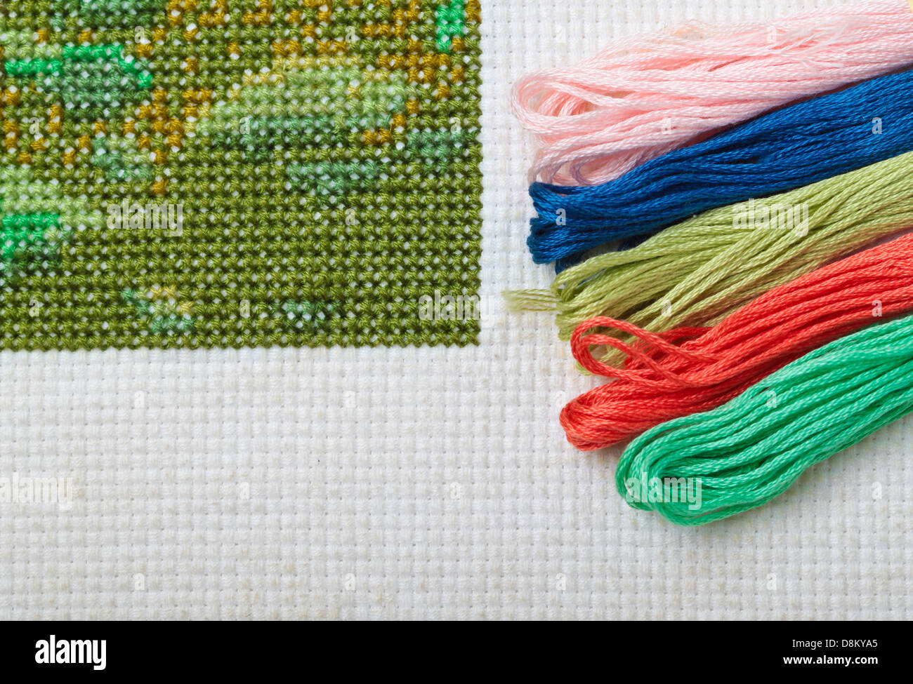 Cross stitch crafting material Stock Photo - Alamy