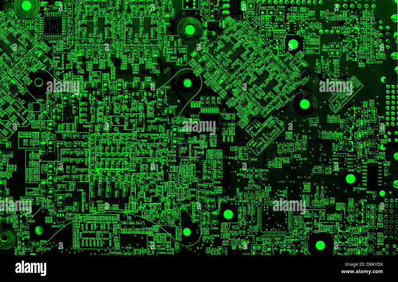 Green computer circuit details in neon light Stock Photo - Alamy
