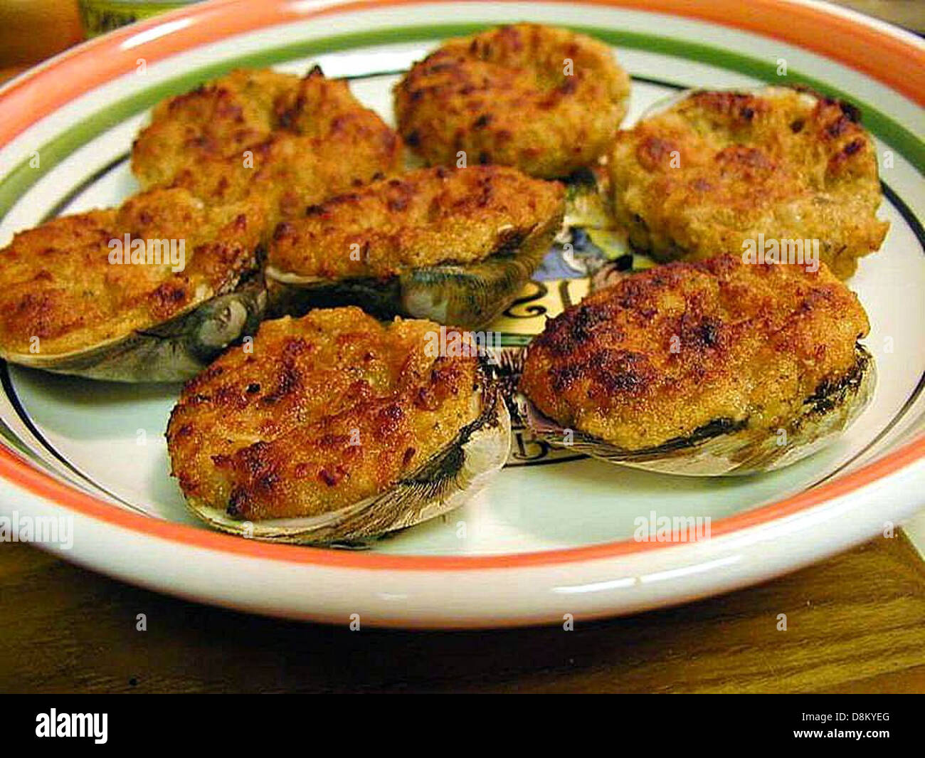 A dish of stuffed clams, prepared by stuffing the shells with a mixture ...
