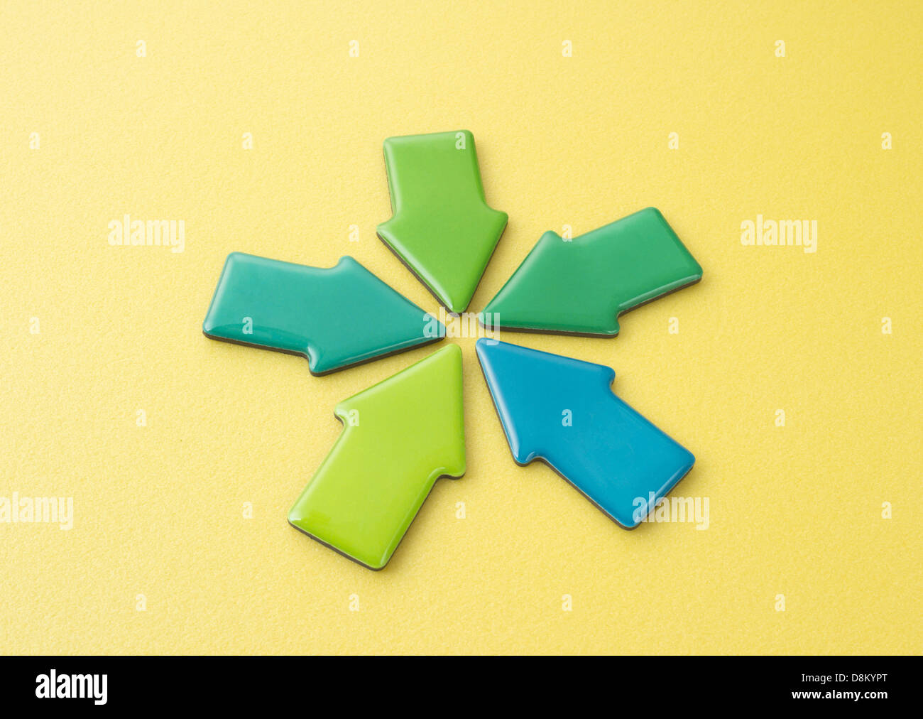 Arrows pointing to center Stock Photo - Alamy
