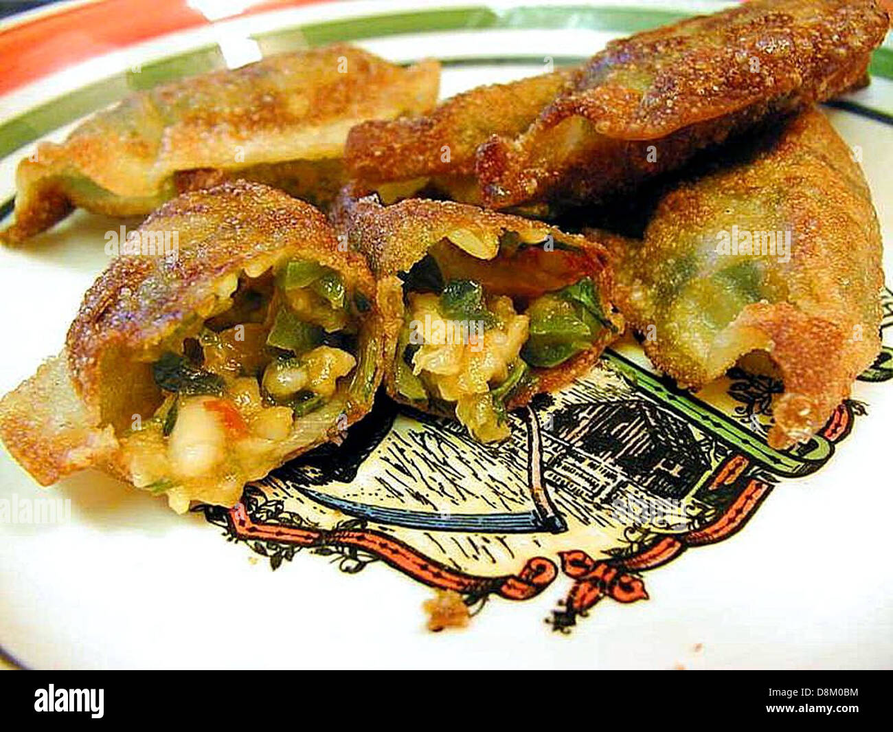 A plate of steaming wontons, a popular Chinese dish made of dough ...