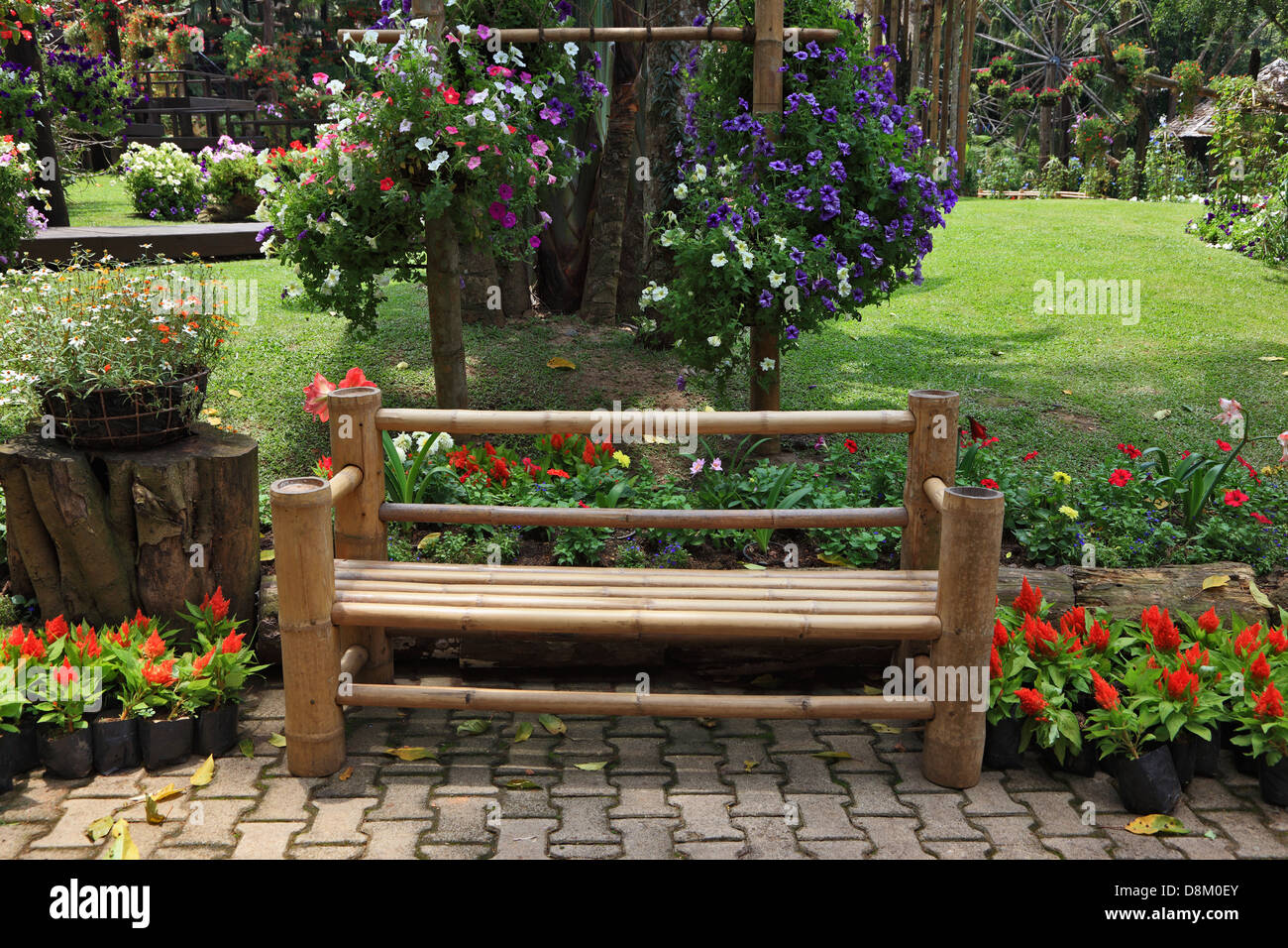 A flowers and a bench Stock Photo - Alamy