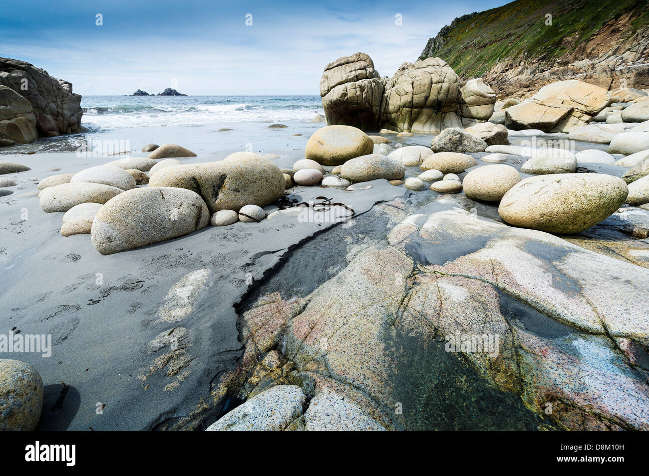 Rocks at Porth Nanven in Cornwall Stock Photo - Alamy