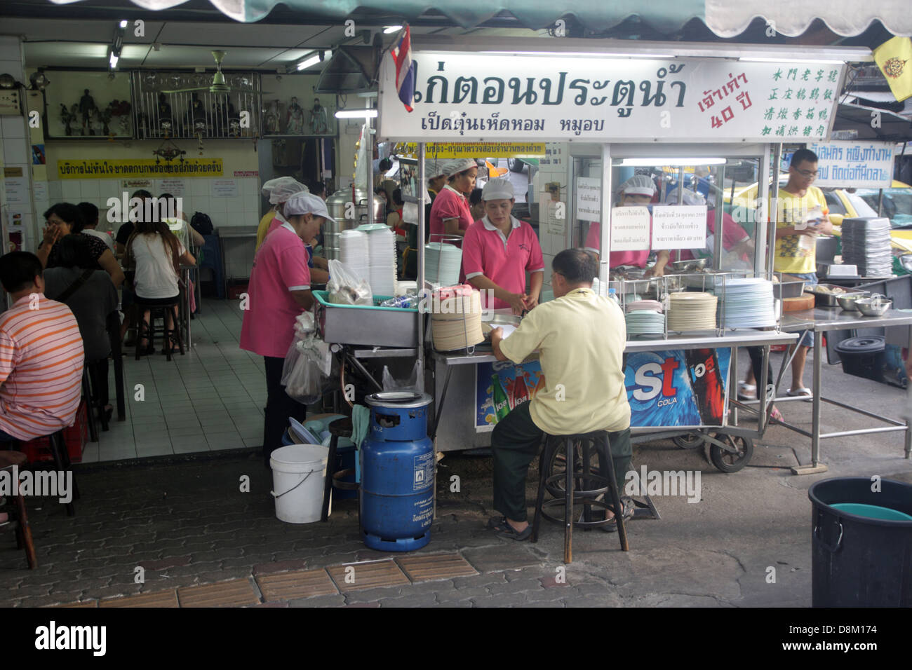 A popular Thai chicken rice ( khow man kai ) restaurant open for over ...