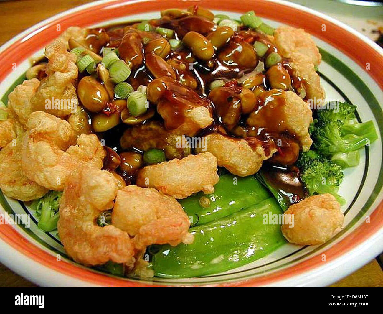 A delicious Kung Pao dish featuring peas, broccoli, peanuts, and shrimp ...