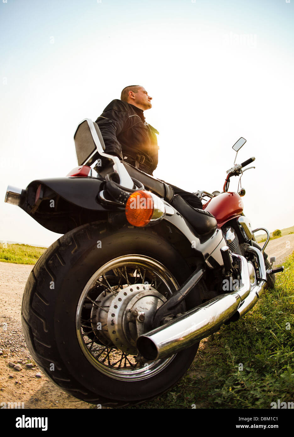 Biker on the country road Stock Photo - Alamy