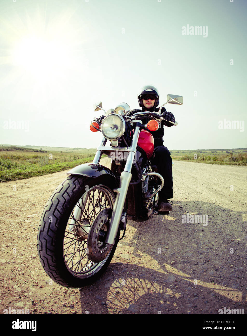 Biker on the country road Stock Photo - Alamy