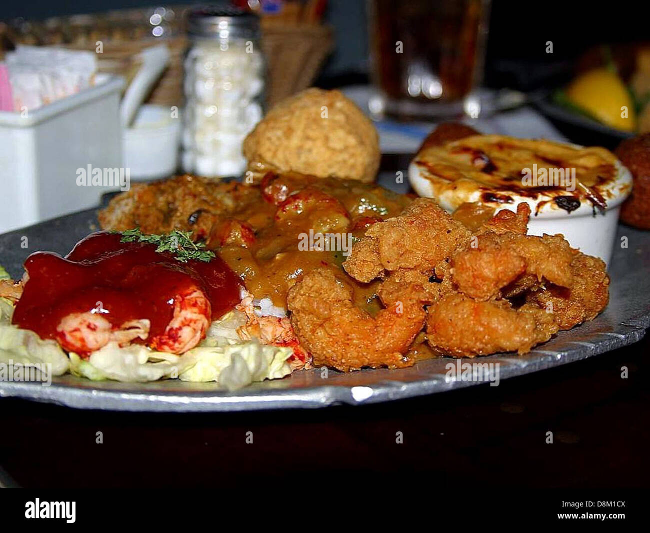 This image displays a variety of crawfish dishes prepared in seven ...