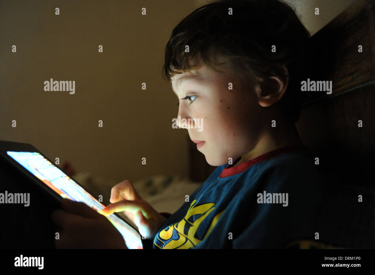 Boy on a computer in his bedroom hi-res stock photography and images ...