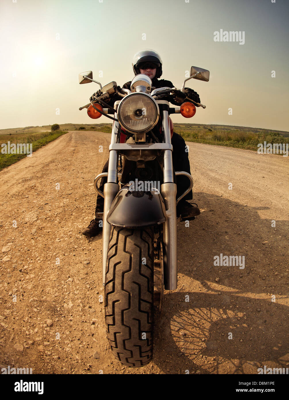 Biker on the country road Stock Photo - Alamy