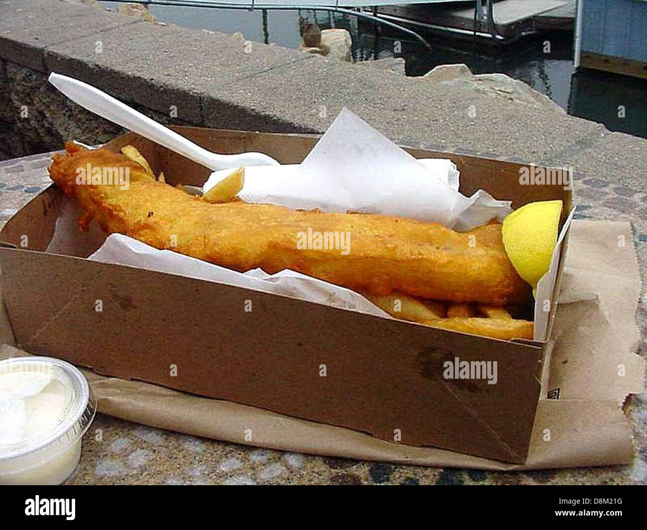 Delicious battered fish chips served hi-res stock photography and ...