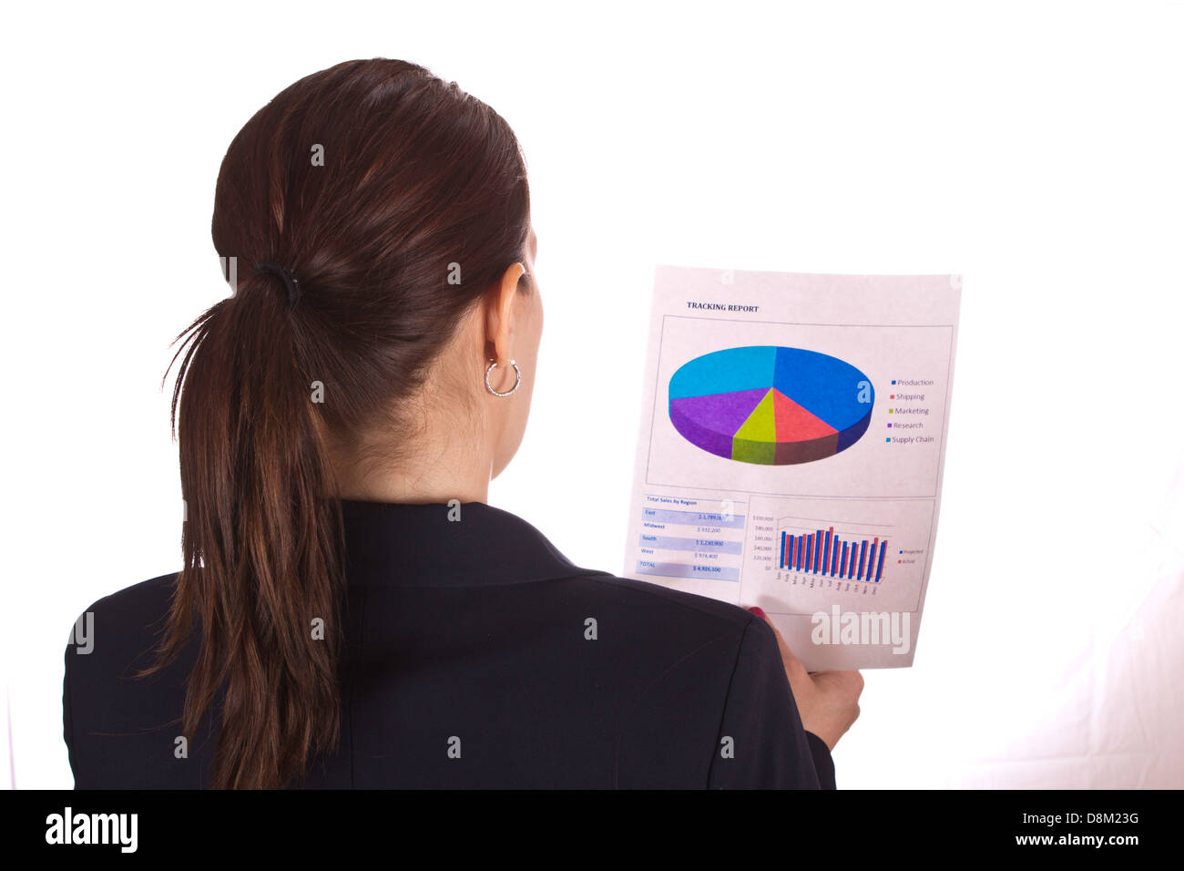 Business woman reads a report Stock Photo - Alamy