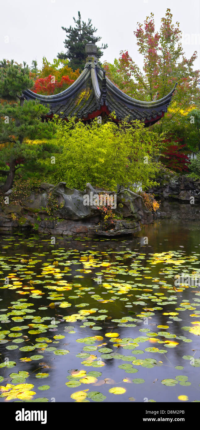 Graceful small house on coast of a pond Stock Photo - Alamy
