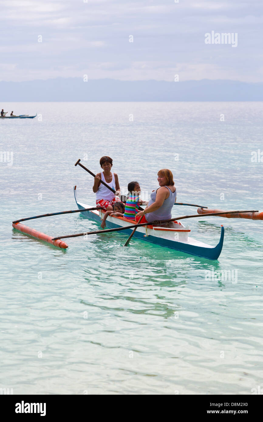 Traditional Boat on the famous White Beach near Moalboal on Cebu Island ...