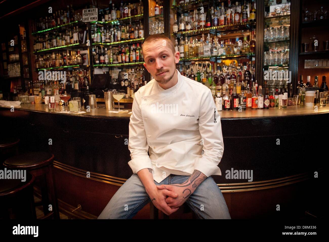 May 28, 2013 - Manhattan, New York, U.S. - STEVE SCHNEIDER, principal bartender at Employees ...