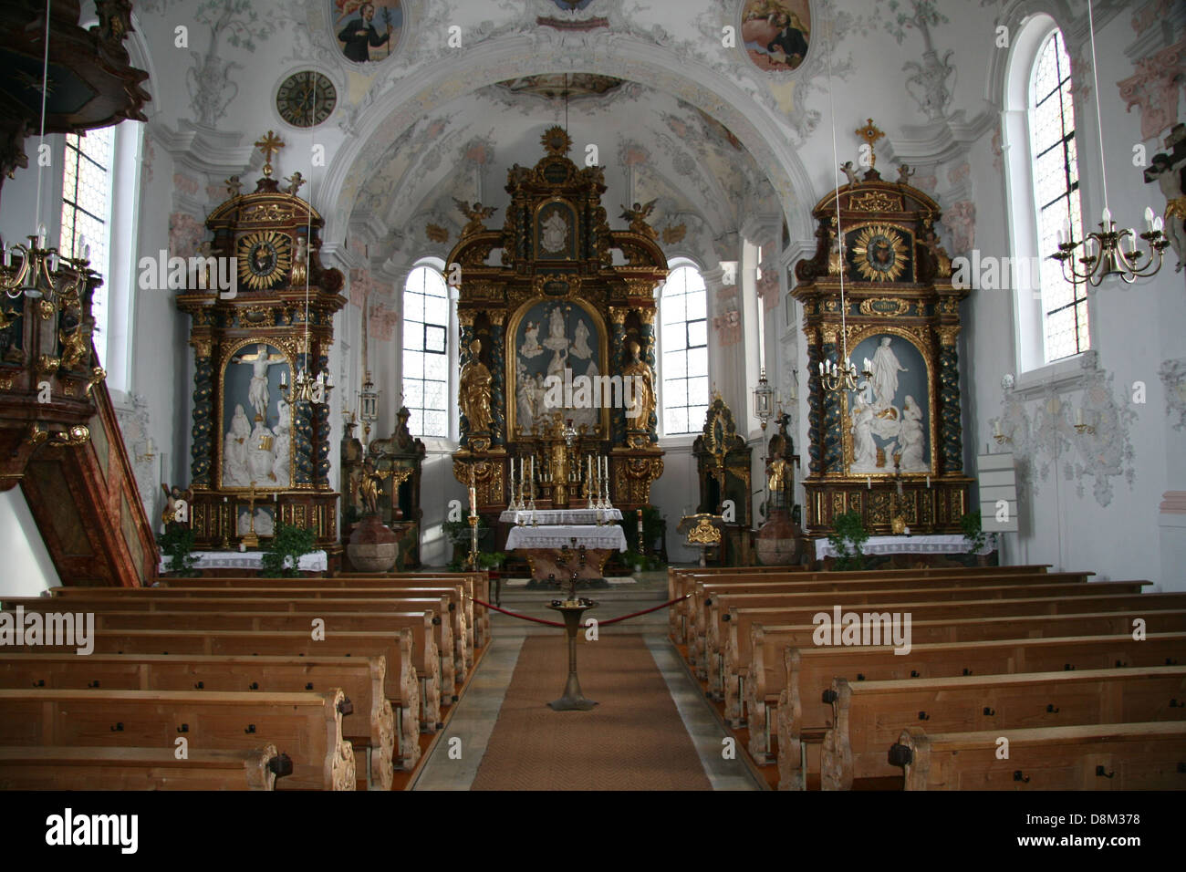A church in Bavaria, Germany, featuring Christian symbols such as ...
