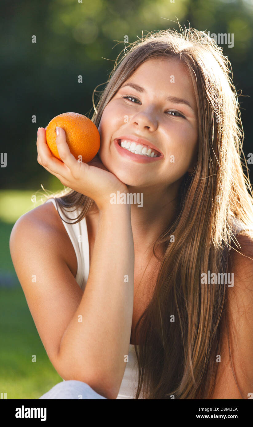 Beautiful young girl with open smile Stock Photo - Alamy