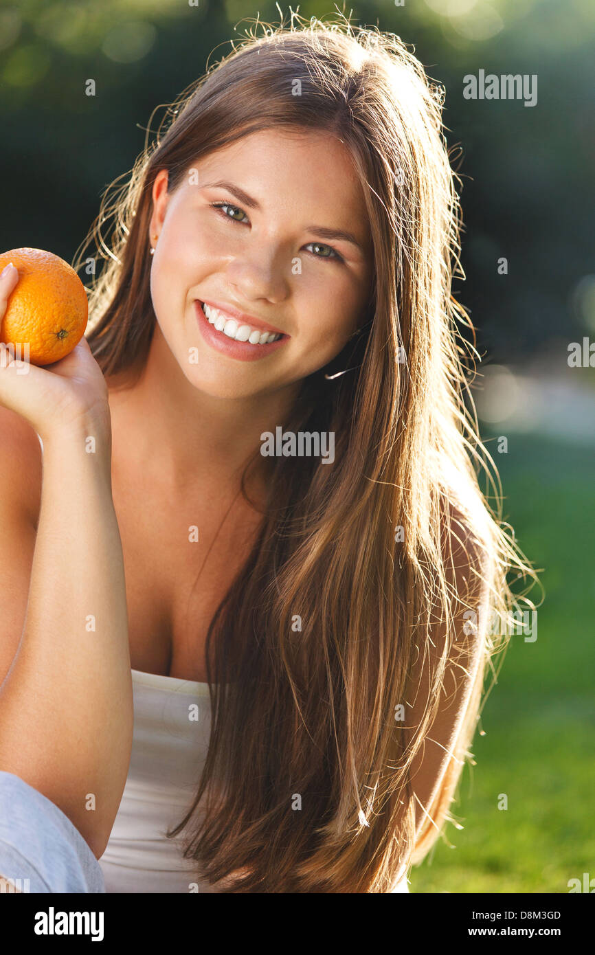 Beautiful young girl with open smile Stock Photo - Alamy