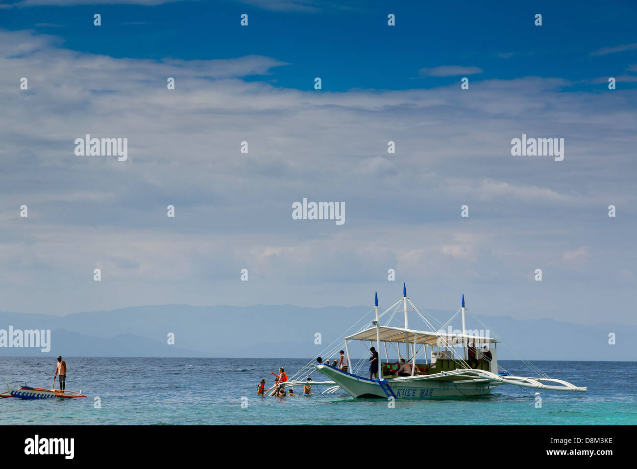 Traditional Boat on the famous White Beach near Moalboal on Cebu Island ...