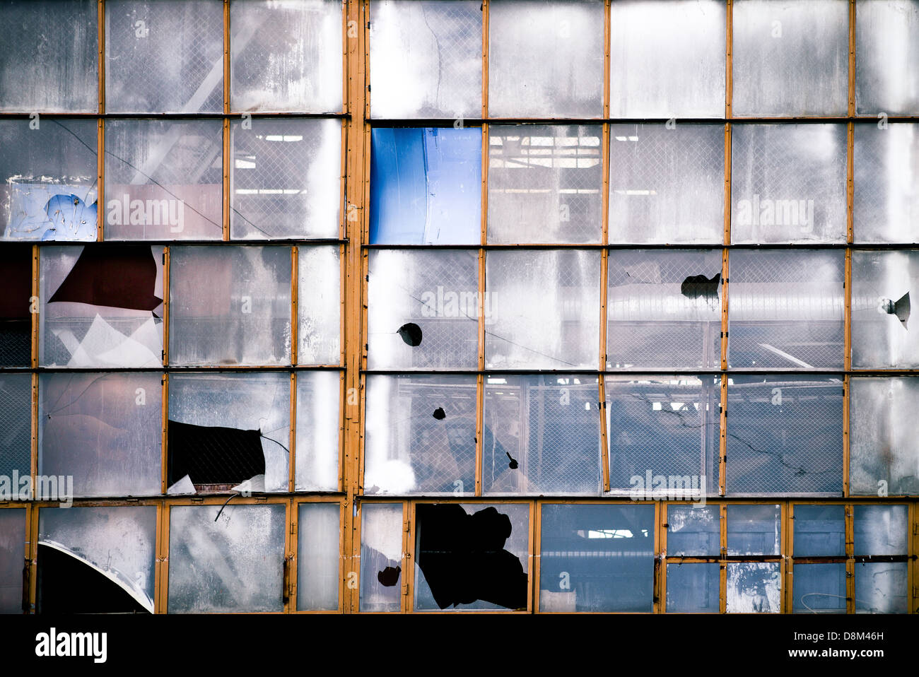 Broken windows of old industrial building Stock Photo - Alamy