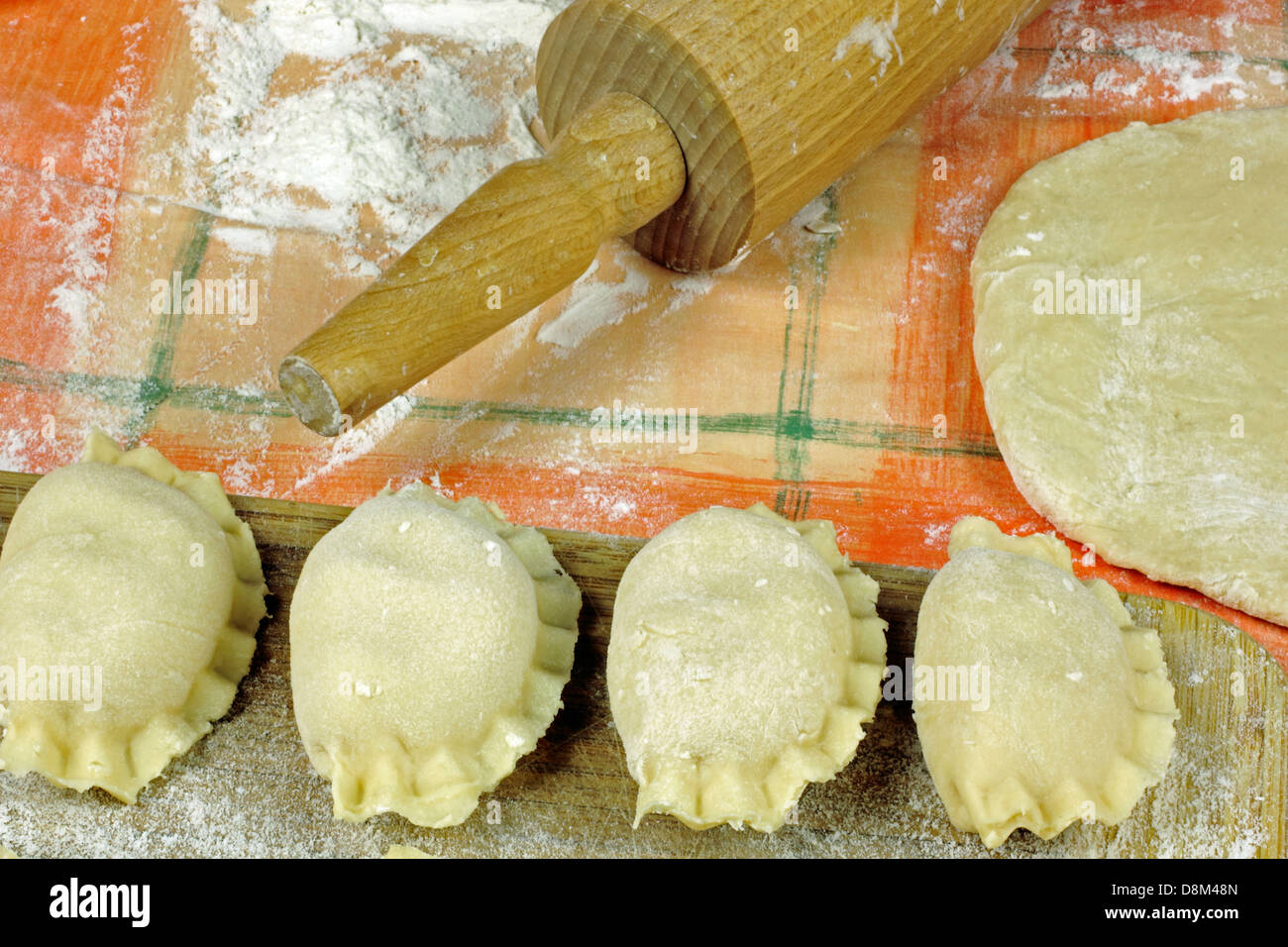 raw homemade polish pierogi dumplings of unleavened dough Stock Photo ...