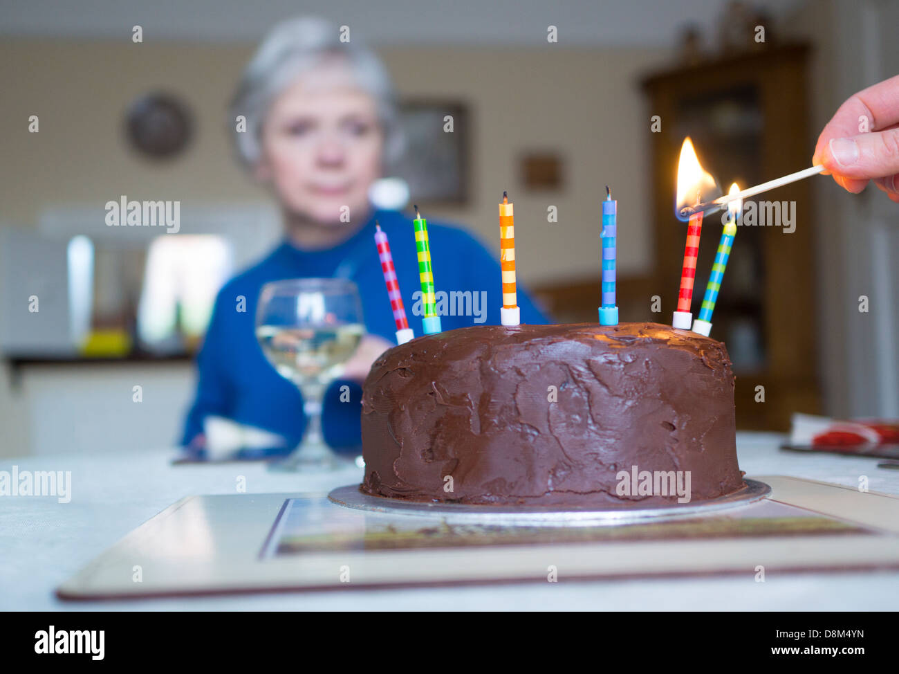 Birthday cake with candles lit hi-res stock photography and images - Alamy