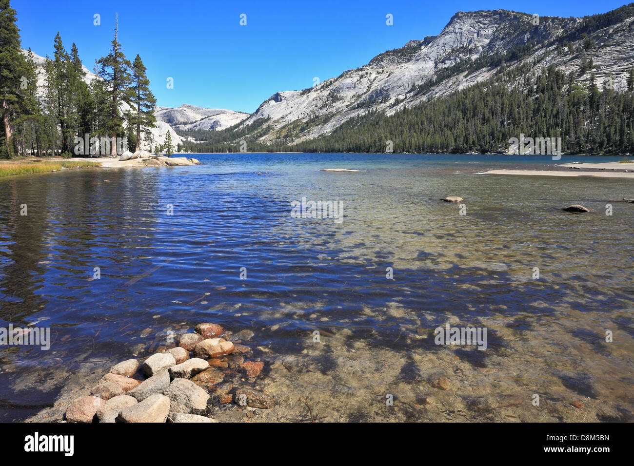 Blue lake in a hollow Stock Photo - Alamy