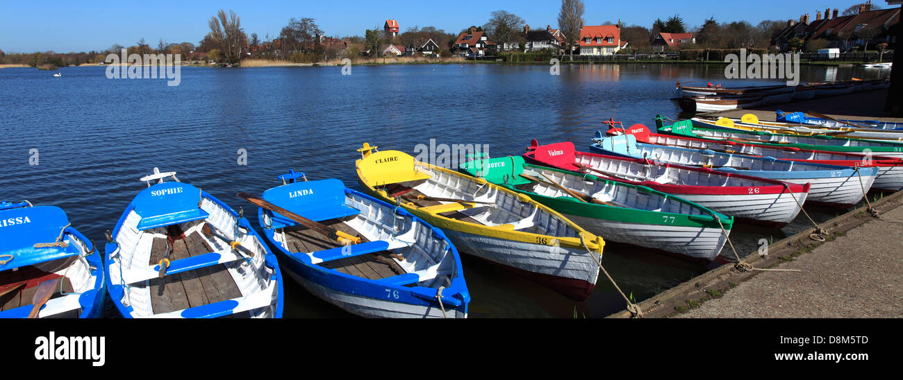 Colourful wooden rowing boats for hire on the Mere lake, Thorpeness ...