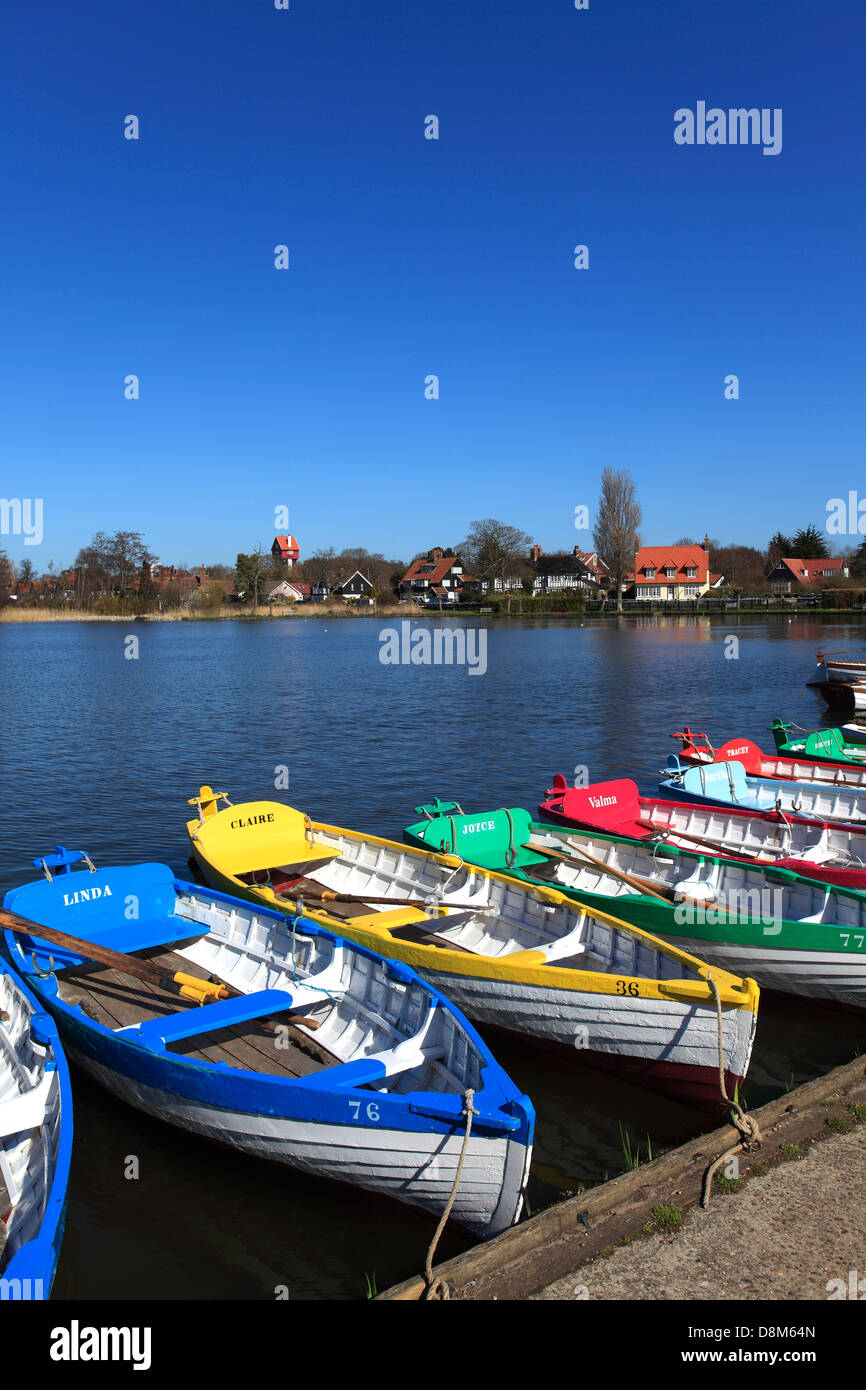 Colourful wooden rowing boats for hire on the Mere lake, Thorpeness ...