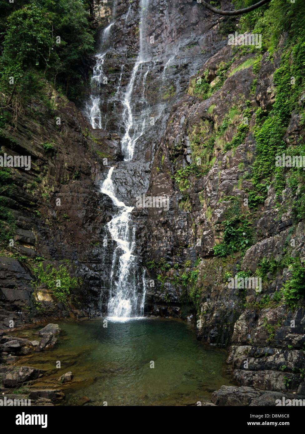 Peaceful waterfall flowing Stock Photo - Alamy
