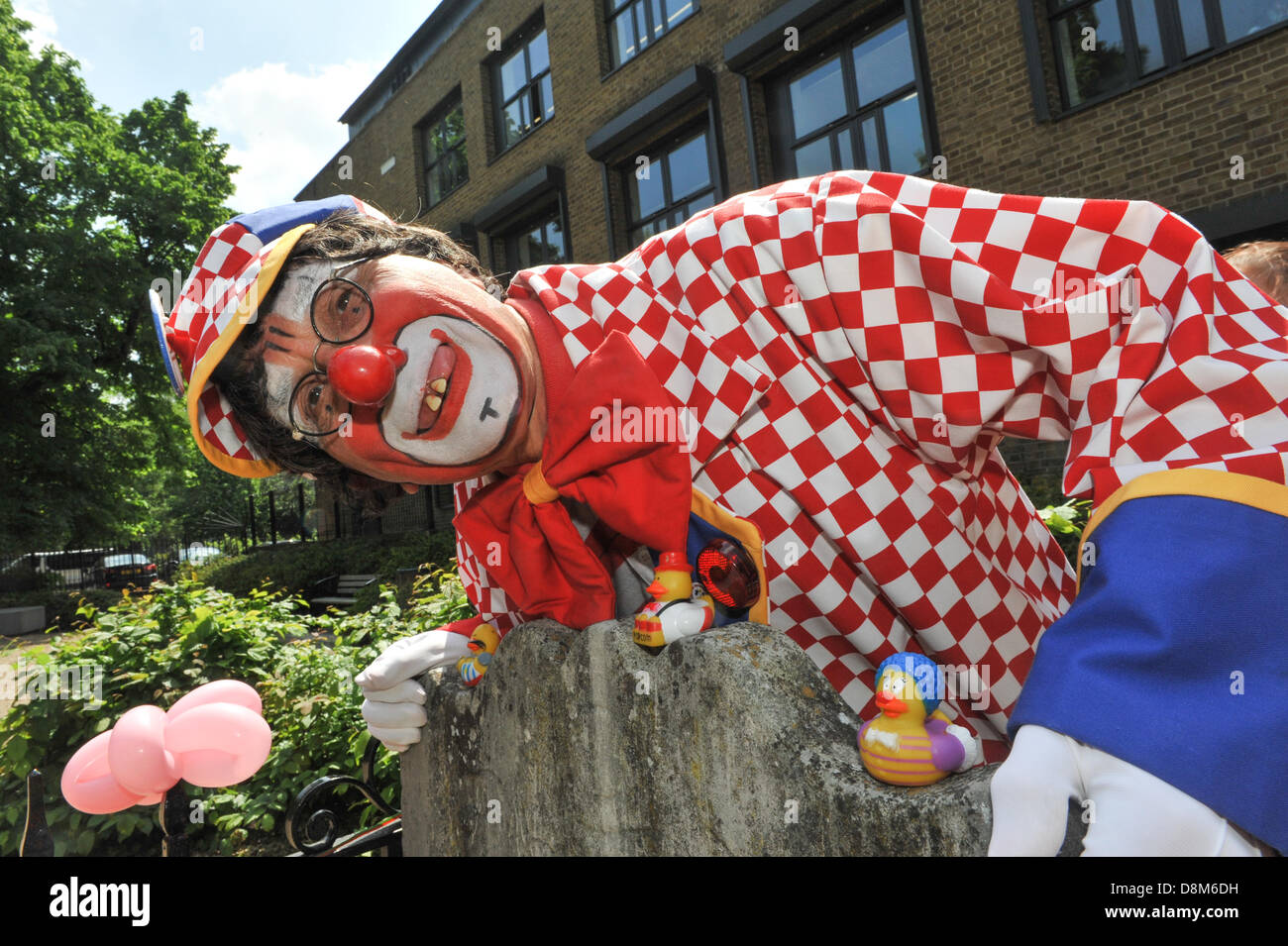 Joseph Grimaldi Park, Pentonville, London, UK. 31st May 2013. A Clown ...