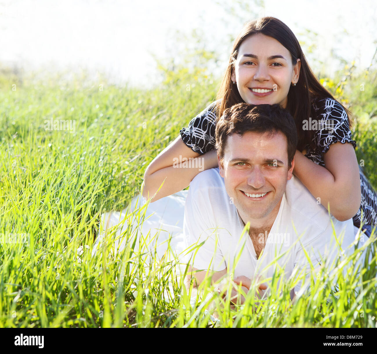 Young happy couple in love in spring day Stock Photo - Alamy