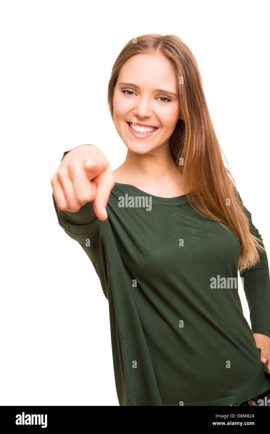 Beautiful blonde woman pointing front Stock Photo - Alamy