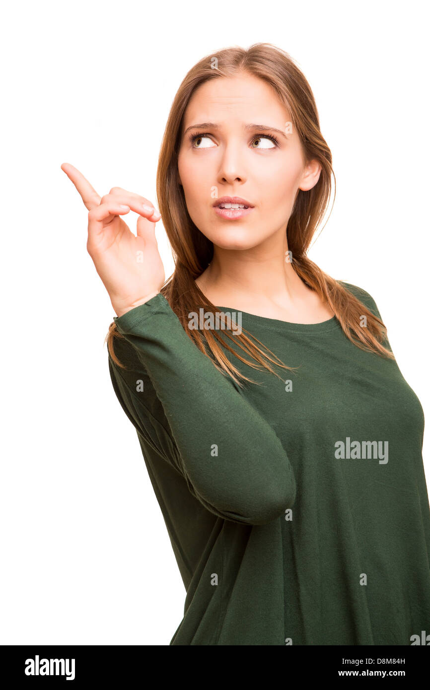 Beautiful blonde woman pointing up Stock Photo - Alamy
