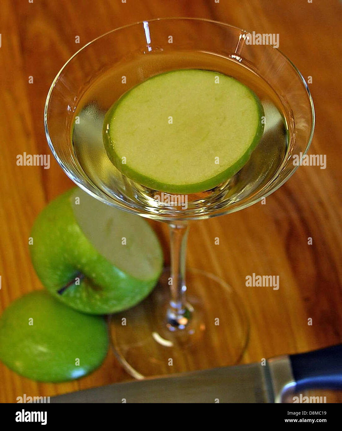 An appletini cocktail, made with vodka, apple schnapps, and a splash of ...