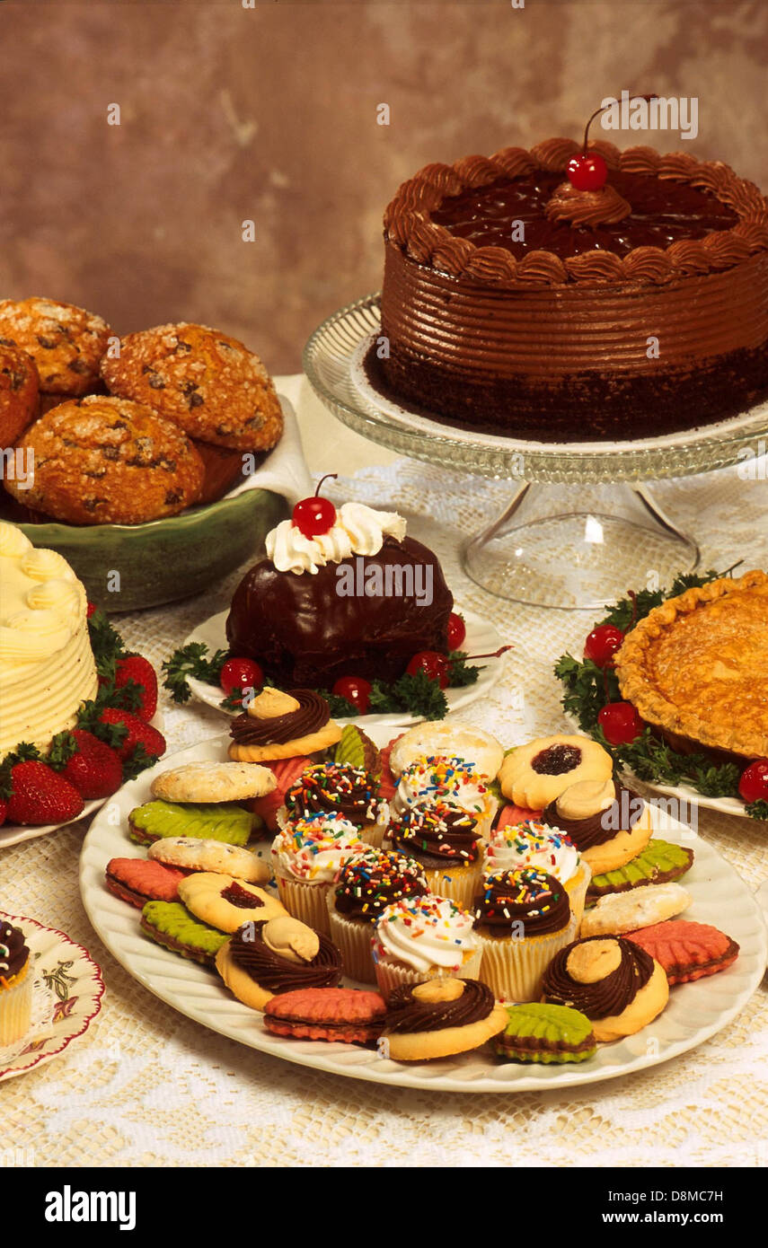 A variety of baked goods and sweets, including pastries, cakes, and ...