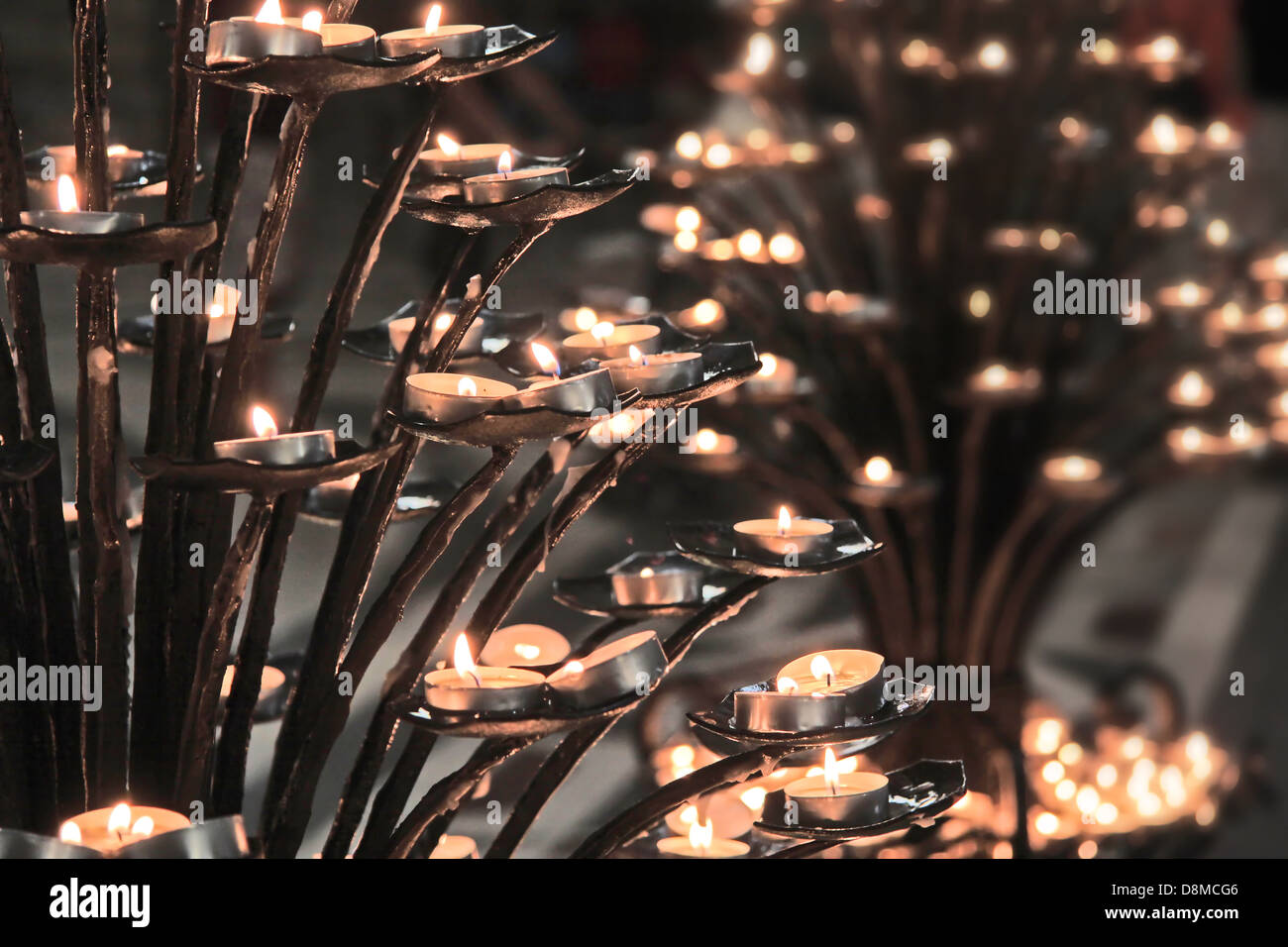Tea lights on an iron chandelier in the Cathedral of Santa Maria del ...