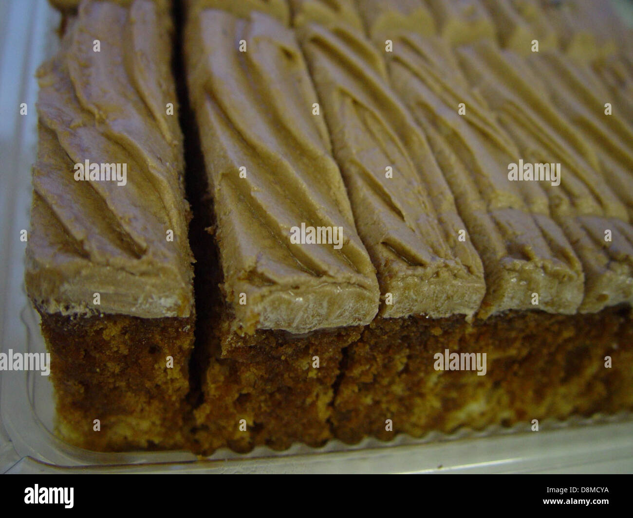 A rich and moist chocolate sponge cake topped with a smooth layer of ...