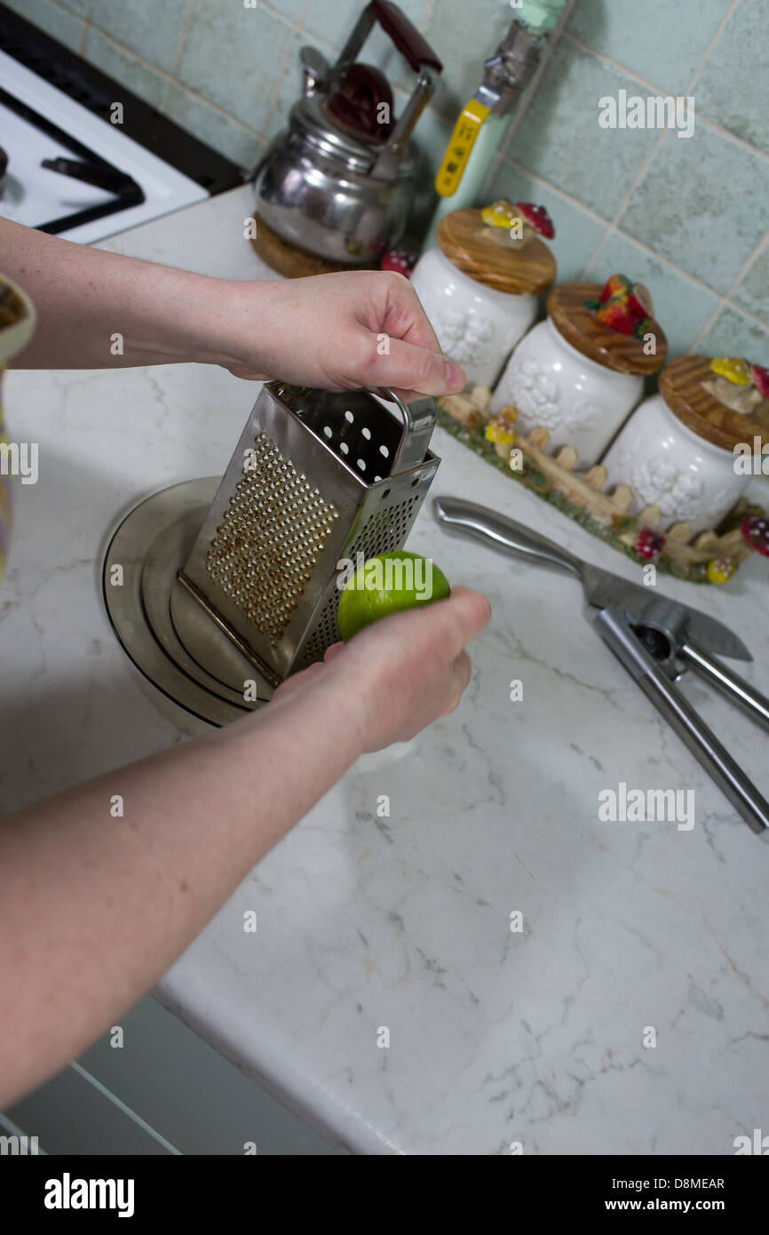 Grinding lime, preparing chicken Mexican dishes Stock Photo - Alamy