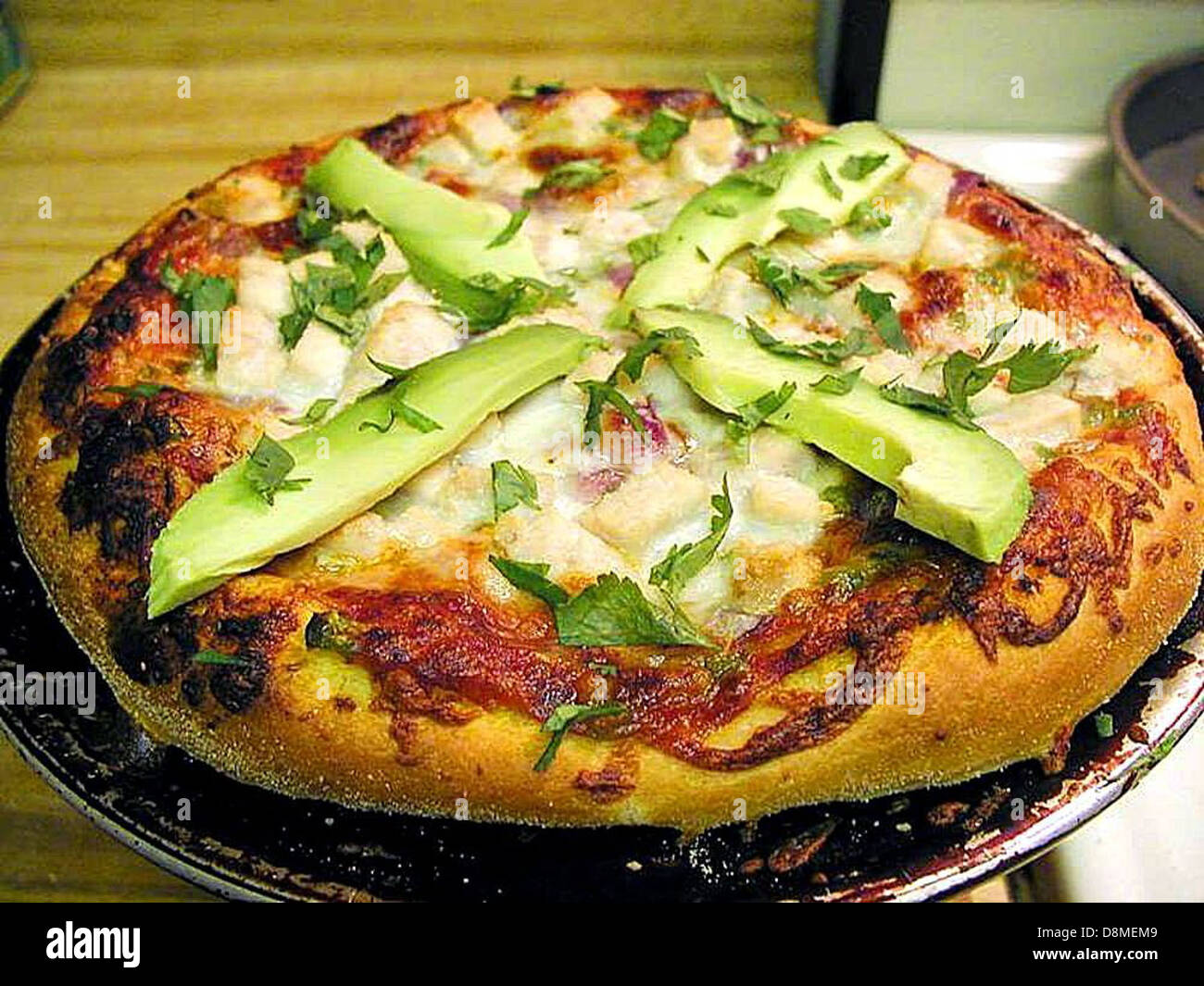 A delicious combination of pizza and fresh avocados, showcasing how ...