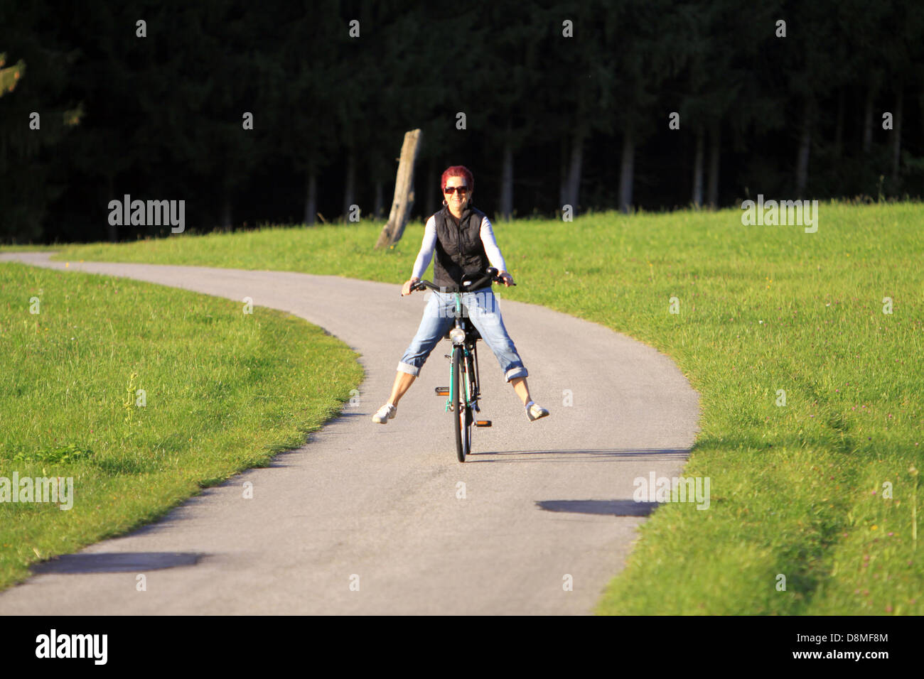 woman on bicycle tour Stock Photo - Alamy