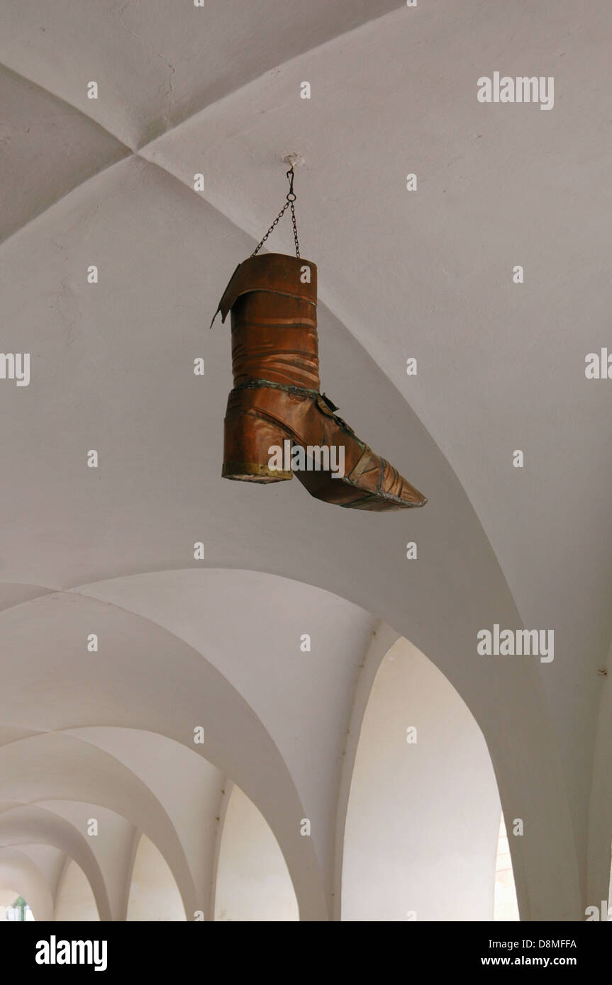 Old boots decorating a Gothic rib vaulting in Hradcany district Prague ...